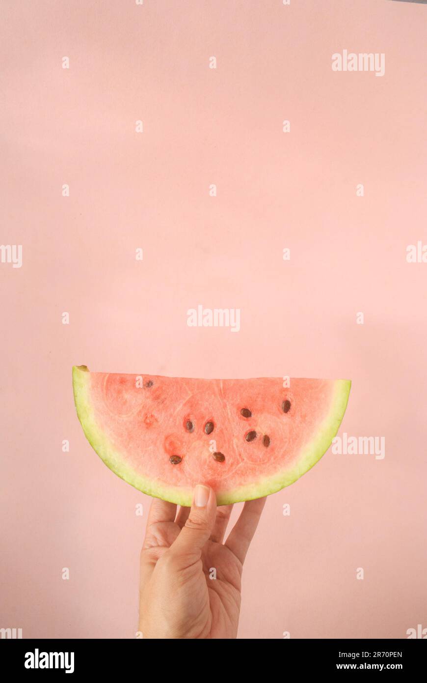 Person holding glass watermelon hi-res stock photography and images - Alamy