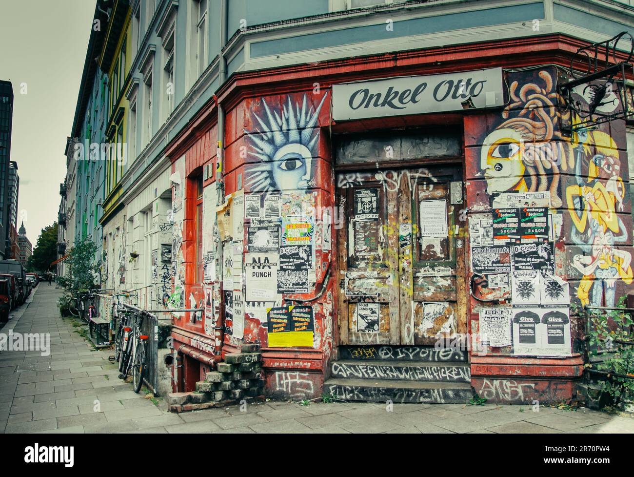 A photograph of a vibrant building with colorful painted walls and a ...