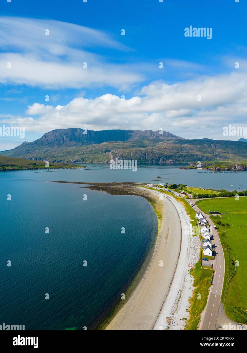 Aerial view of village of Ardmair with mountains of Coigach to rear ...