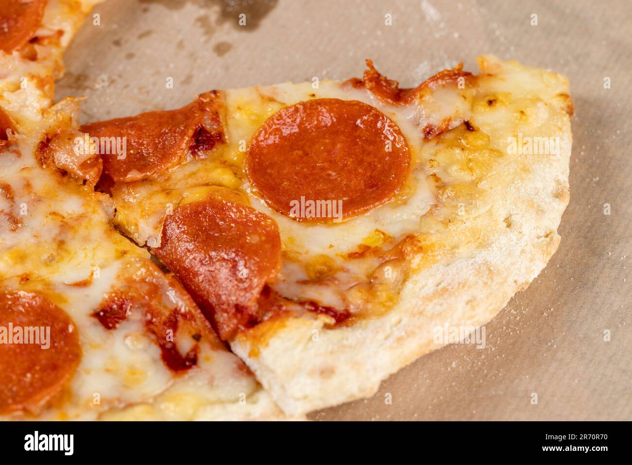 small homemade spicy pizza with sausage and cheese, chilled pizza of ...