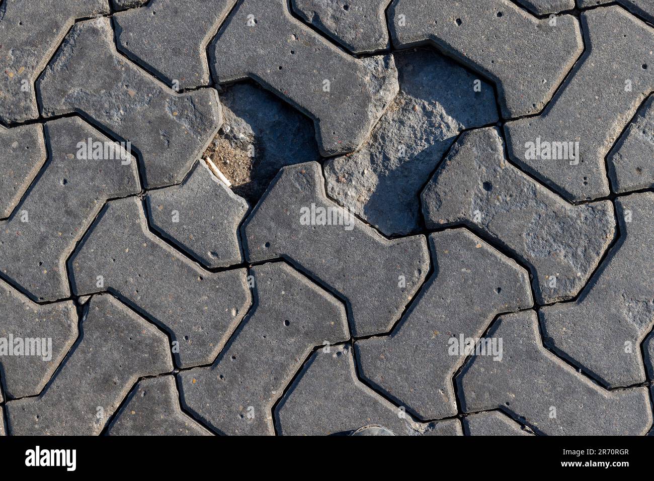 Concrete tile which paved part of the road for traffic, part of the ...