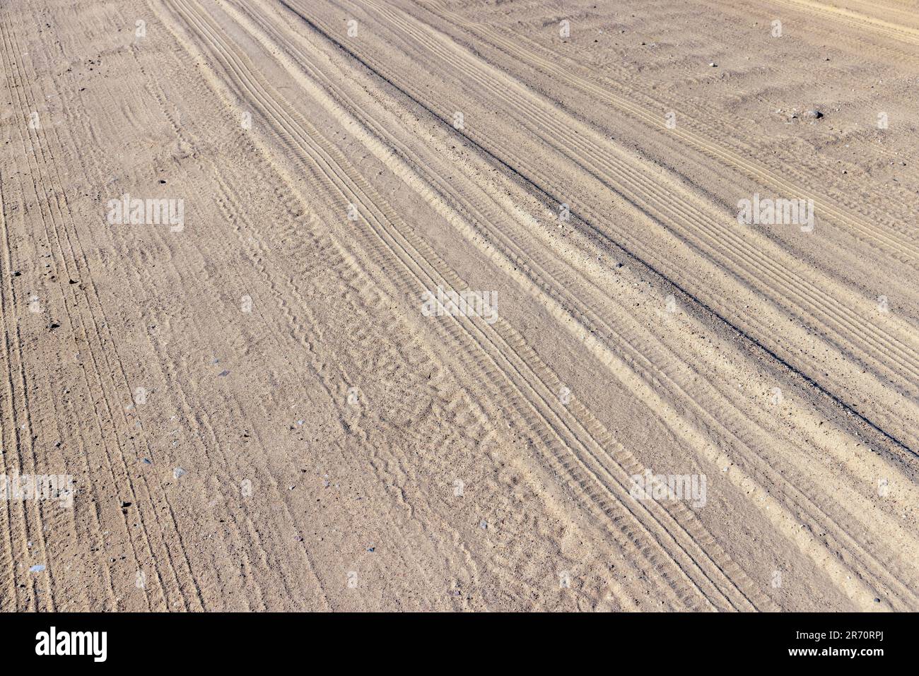 Rural road for cars and transport, ruts and traces of cars on a sandy ...