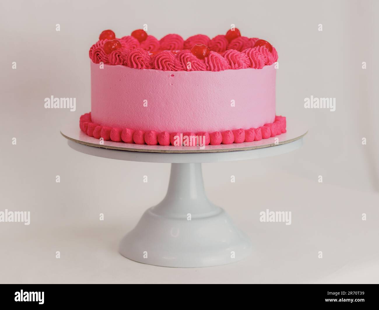 Pink frosted icing elegnt cake with funny lettering topper. Celebration ...