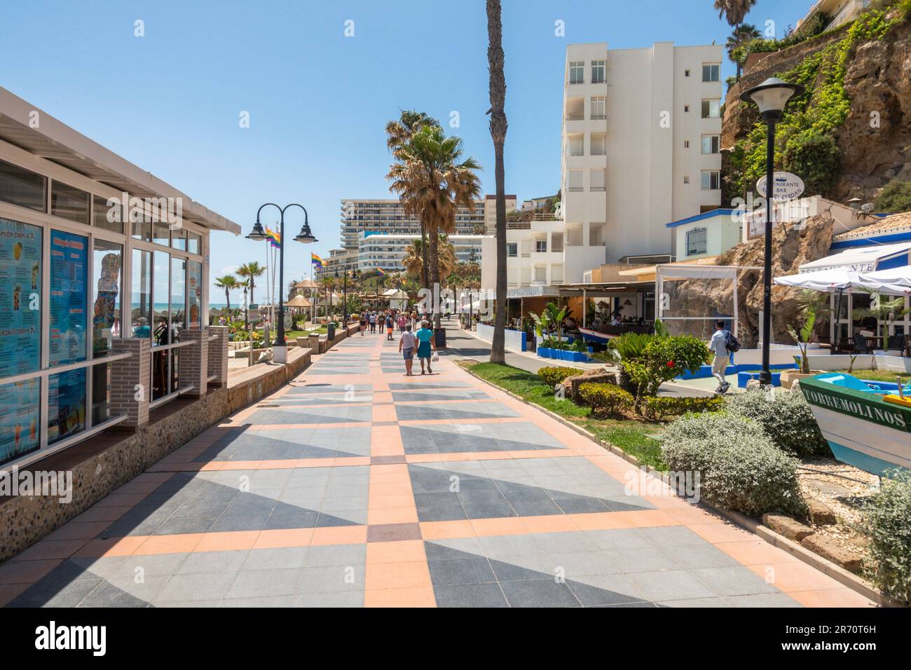 Carihuela, Torremolinos Spain, tourists walking along the waterfront ...