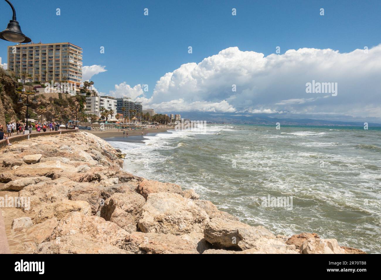 Pedestrian walkway with hotels next to beach in summer, Benalmadena ...