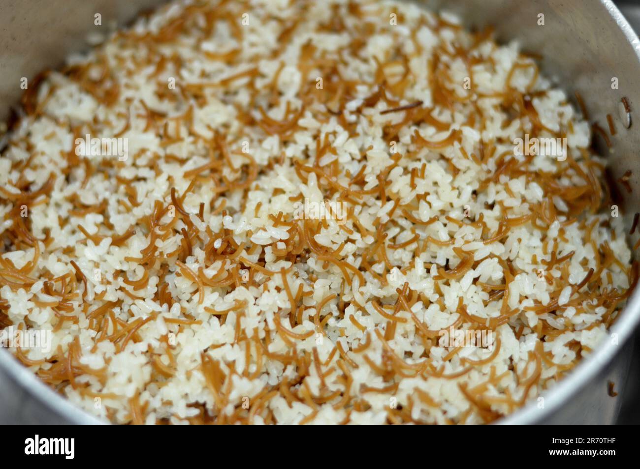 Egyptian rice with vermicelli cooked on hot steam, short grain white ...
