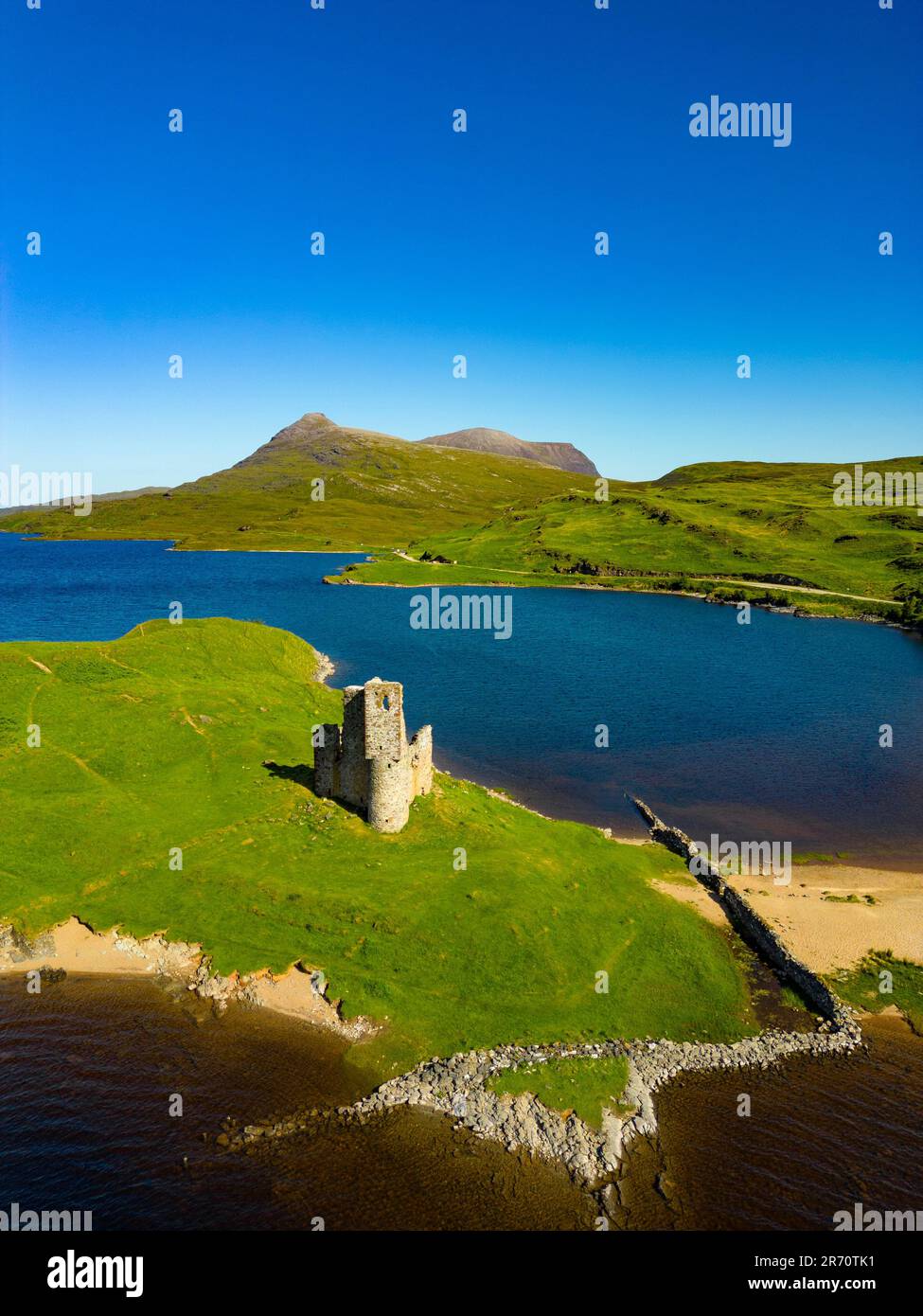 Aerial view from drone of Ardvreck Castle on North Coast 500 route at ...