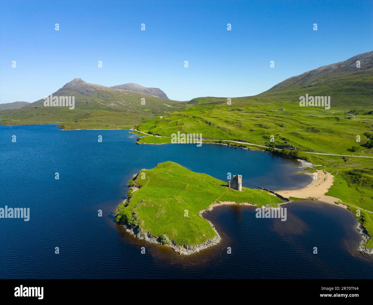 Aerial view from drone of Ardvreck Castle on North Coast 500 route at ...
