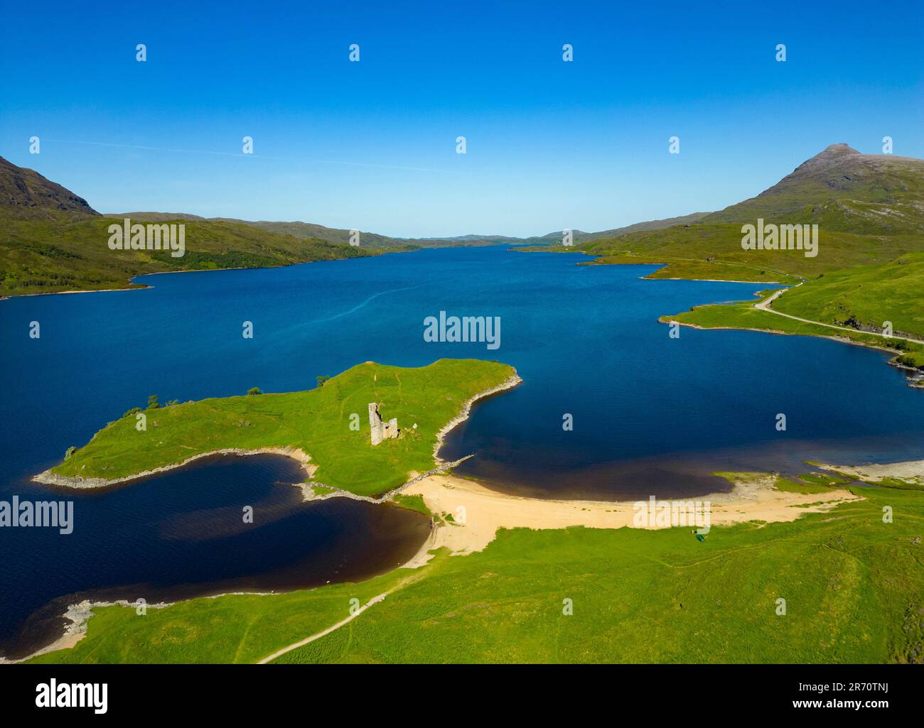 Aerial view from drone of Ardvreck Castle on North Coast 500 route at ...
