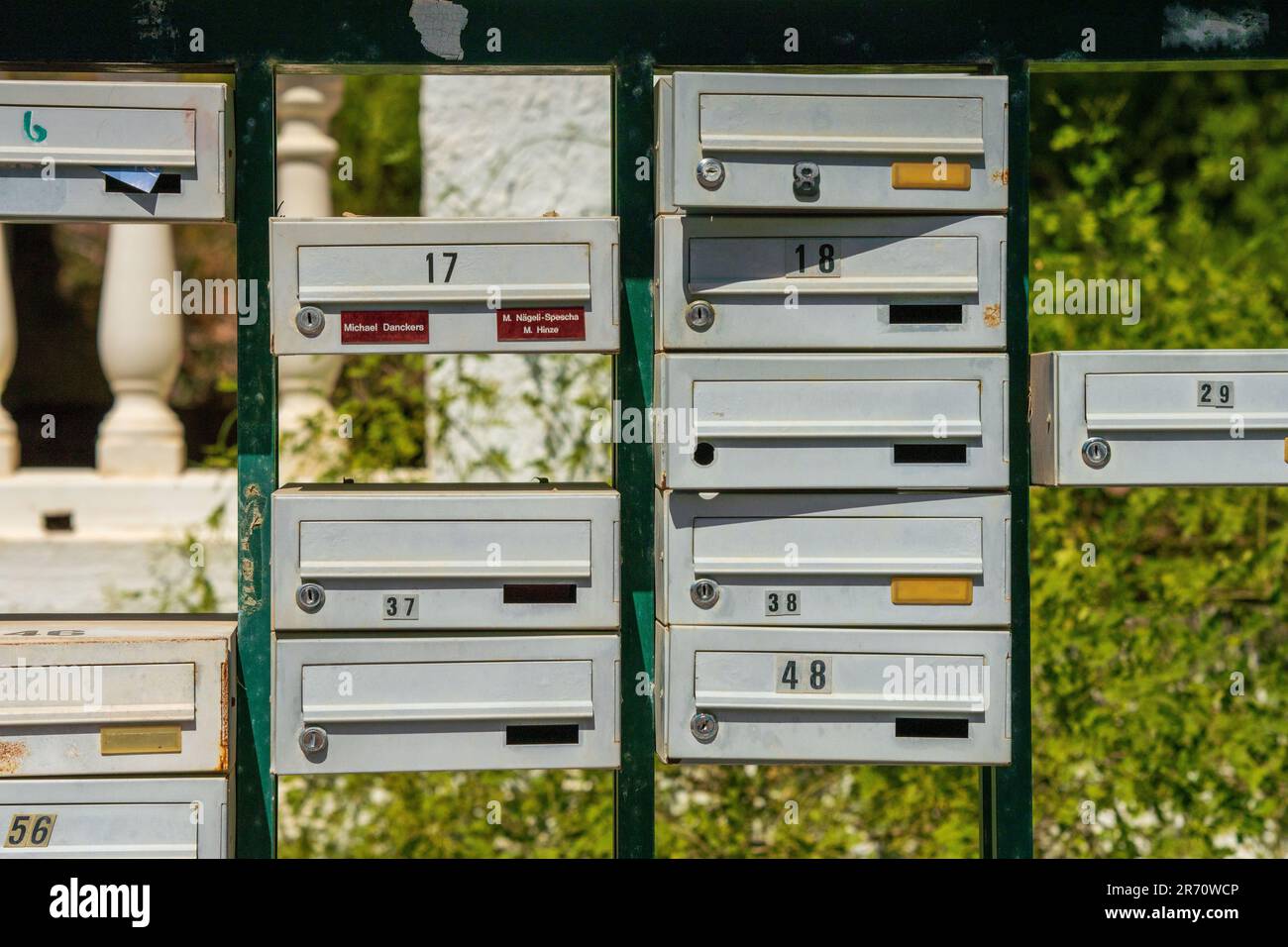 various colored mailboxes along the side of the road Stock Photo - Alamy