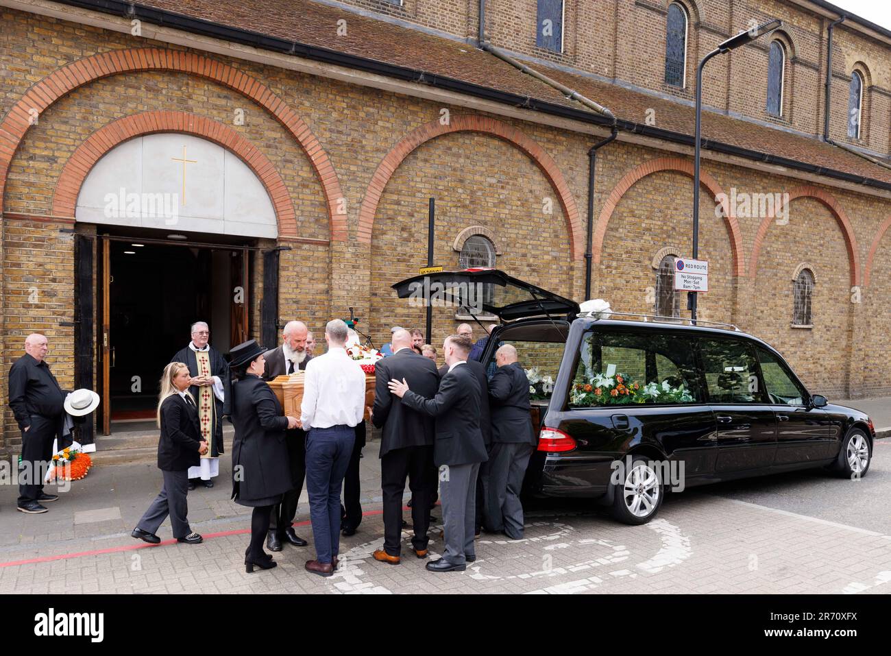 The the coffin of Hugh Callaghan is carried into The Immacutate Heart ...