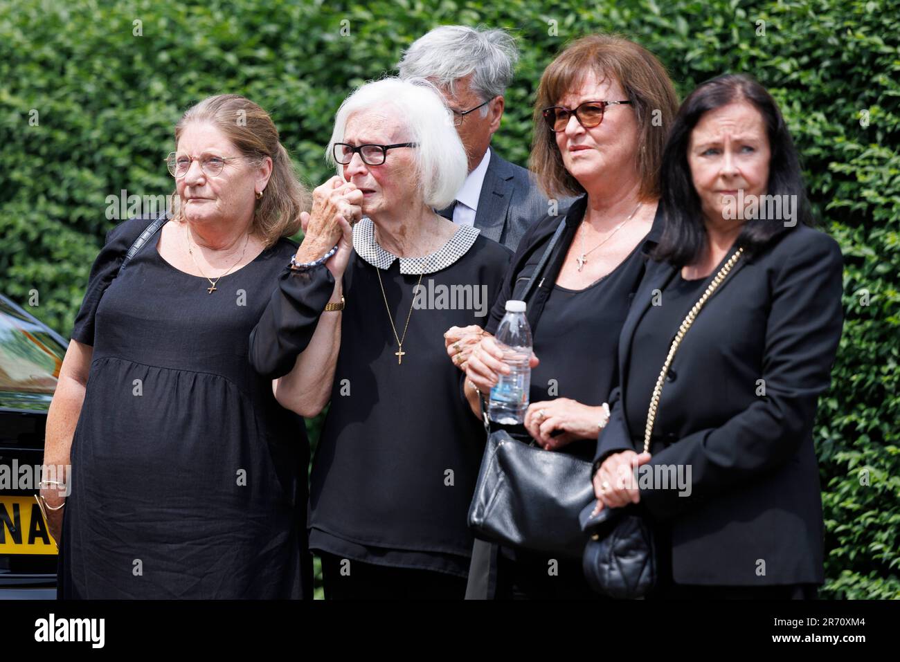 Mourners arrive for the funeral of Hugh Callaghan at the Immacutate ...