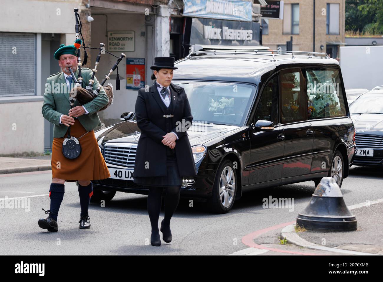 The hearse carrying the coffin of Hugh Callaghan arrives for his ...