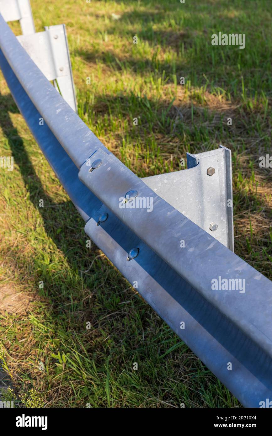 Metal fencing on the highway for safety, steel fencing to protect ...