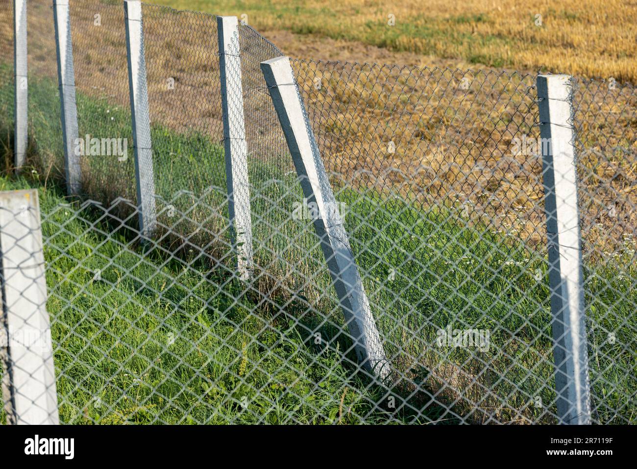 Metal fence to ensure security, delineation of the territory of ...
