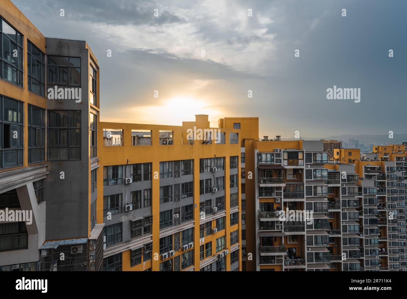 The sunrise illuminates the urban residential buildings in Chengdu ...