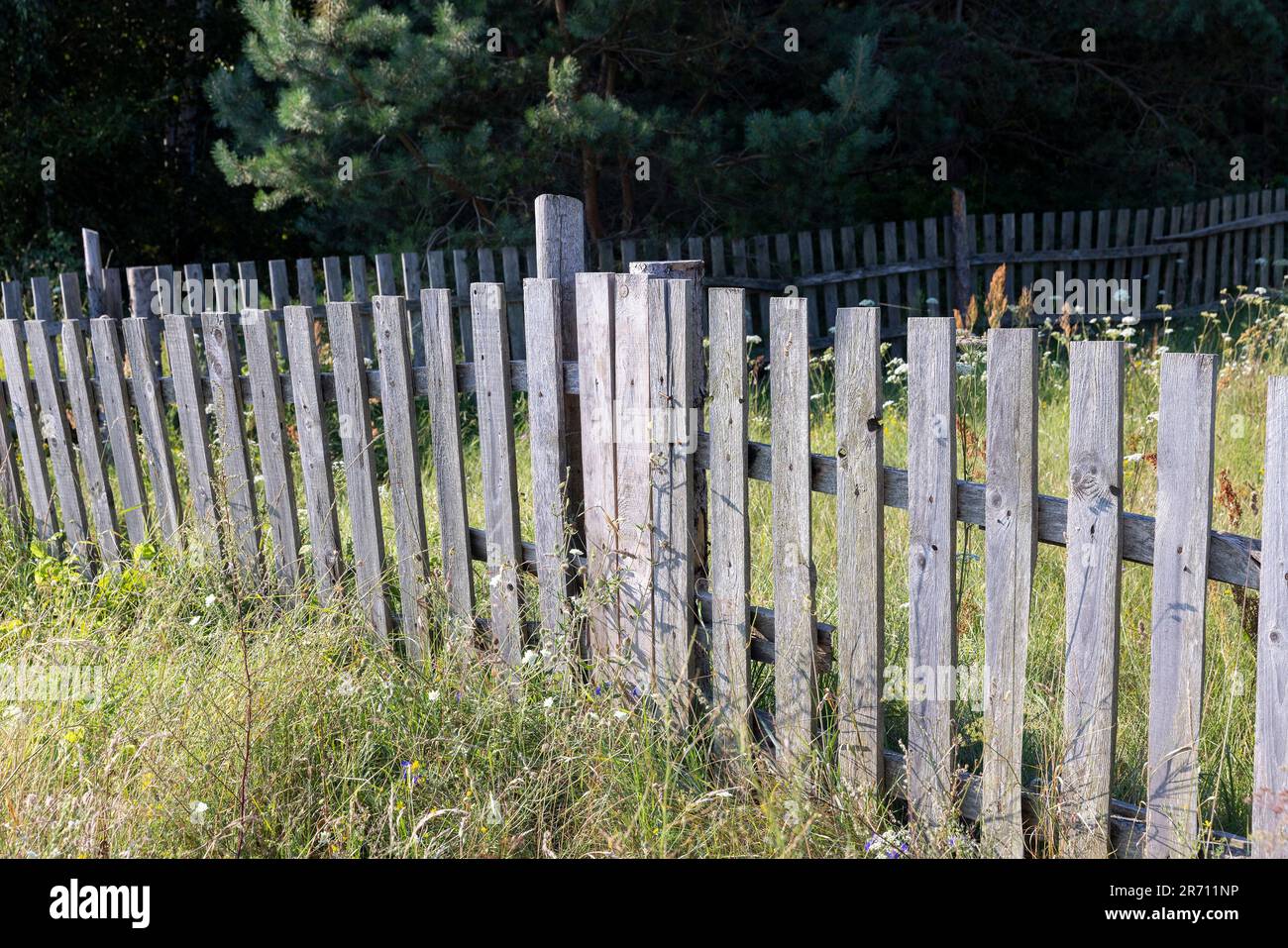Wooden fence for security, delineation of the territory of different ...
