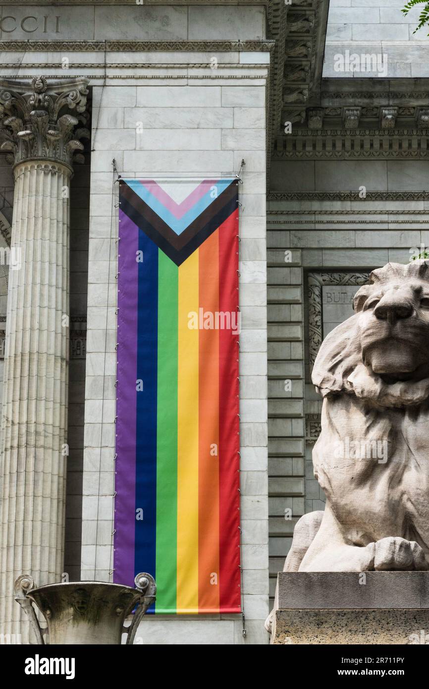 Lion in front of the New York Public Library with a Pride banner in the ...