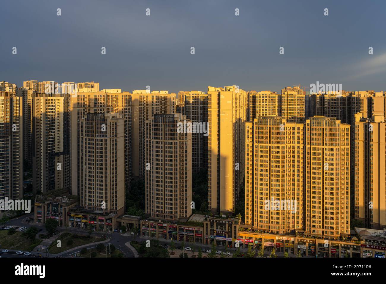 The sunrise illuminates the urban residential buildings in Chengdu ...