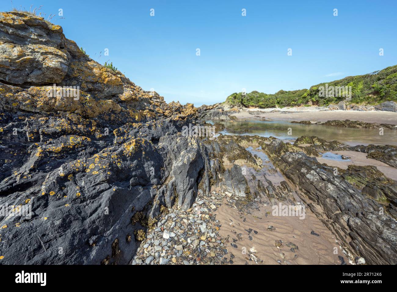 Impressive rocky landscape at Angle Bay beach Pembrokeshire full of ...