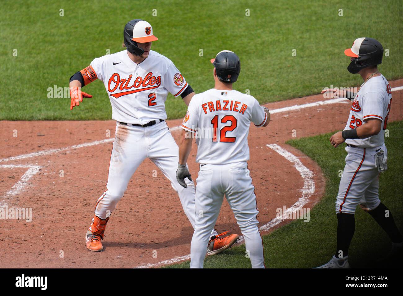 Baltimore Orioles' Gunnar Henderson (2) celebrates with Adam Frazier ...