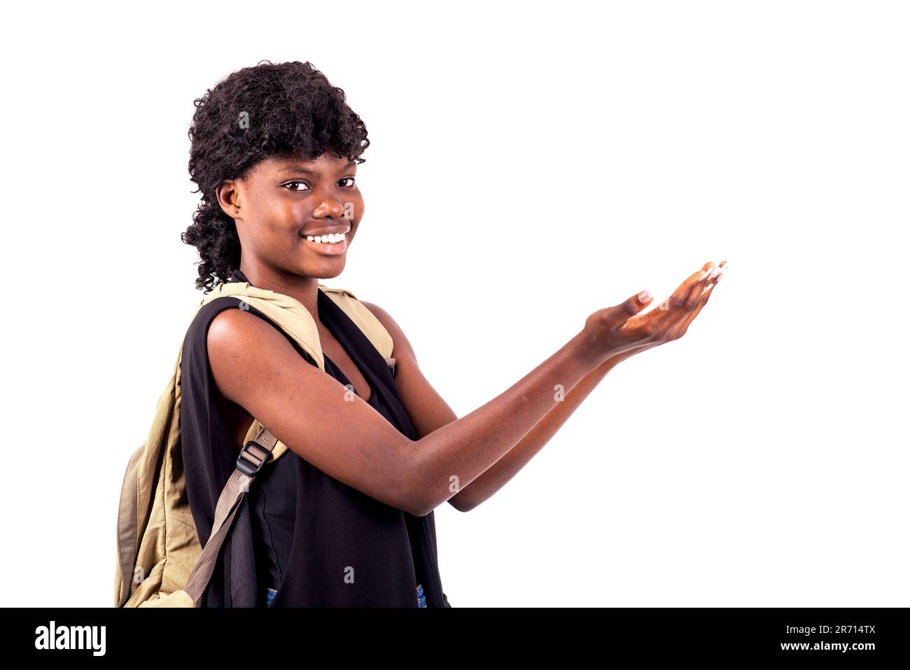 young student girl carrying backpack, with empty hands showing ...