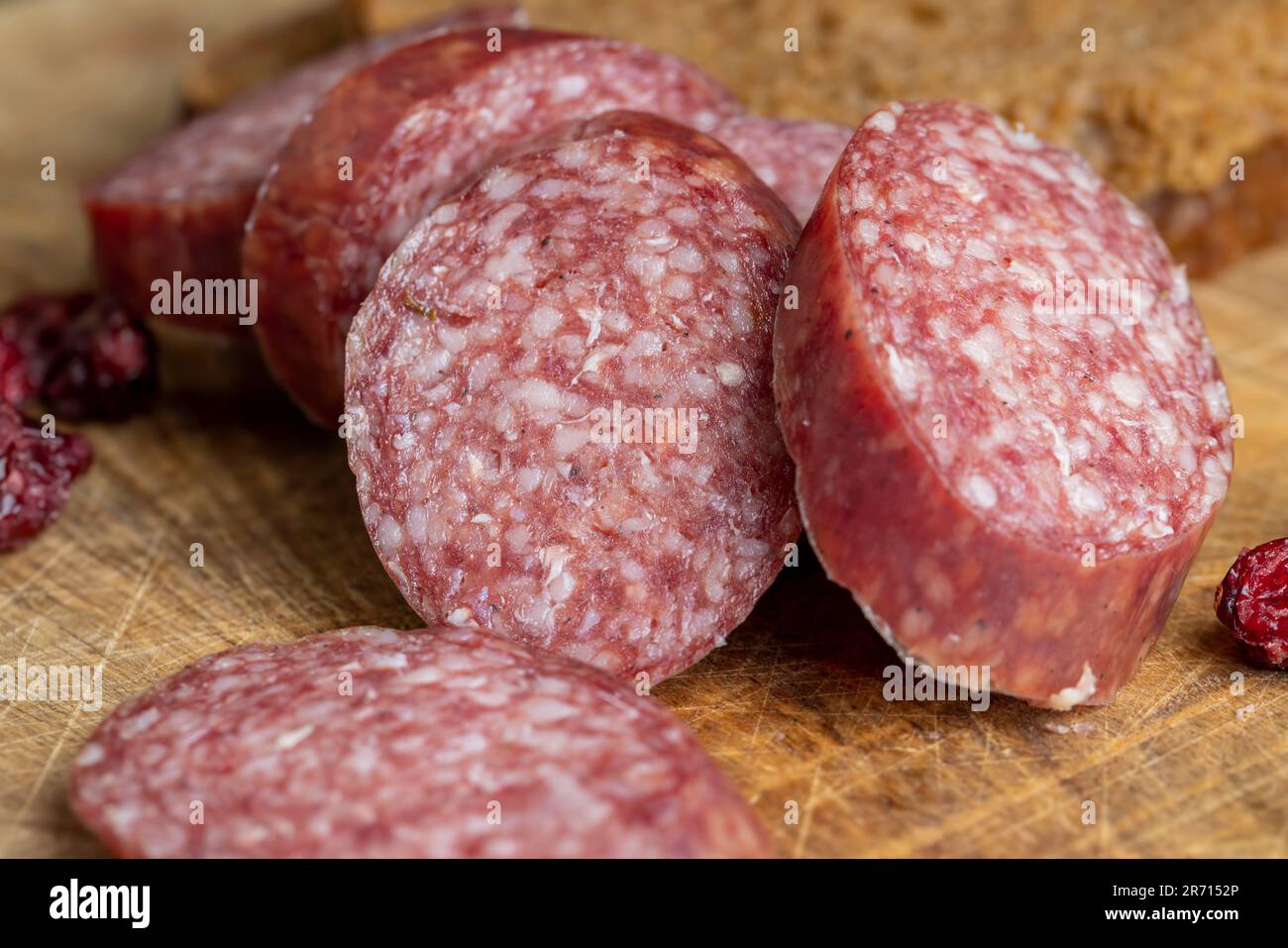 Sausage of moose meat cut into pieces, preparation of snacks from wild ...