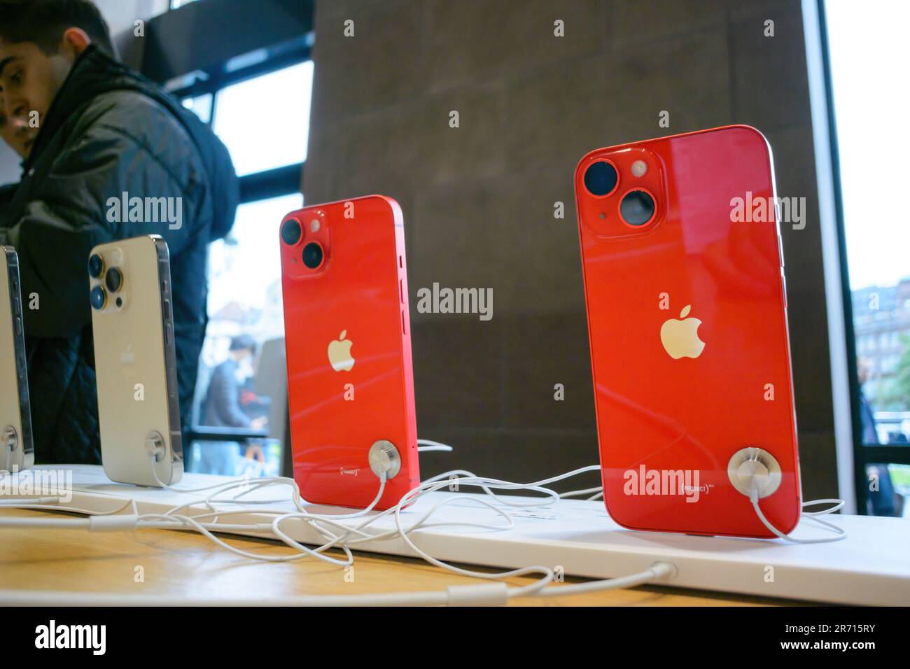 Paris, France - Sep 22, 2022: red iPhone SE and iPhones Pro in a row ...