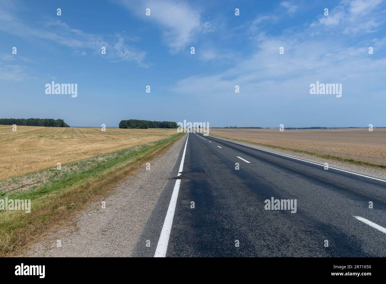 Narrow paved road for cars, part of a modern paved expressway for motor ...