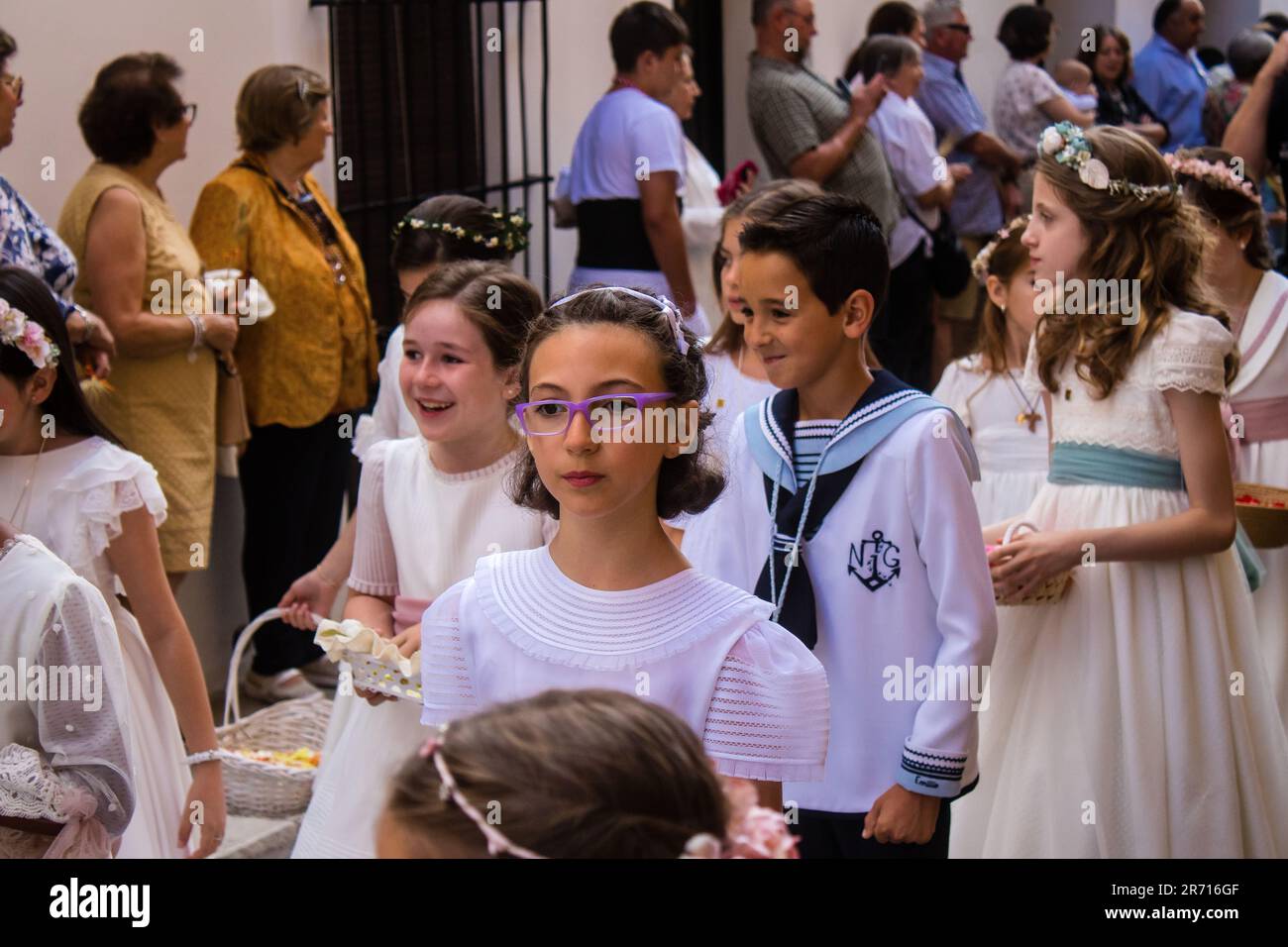 Young children participating at the Corpus Christi procession, an age ...