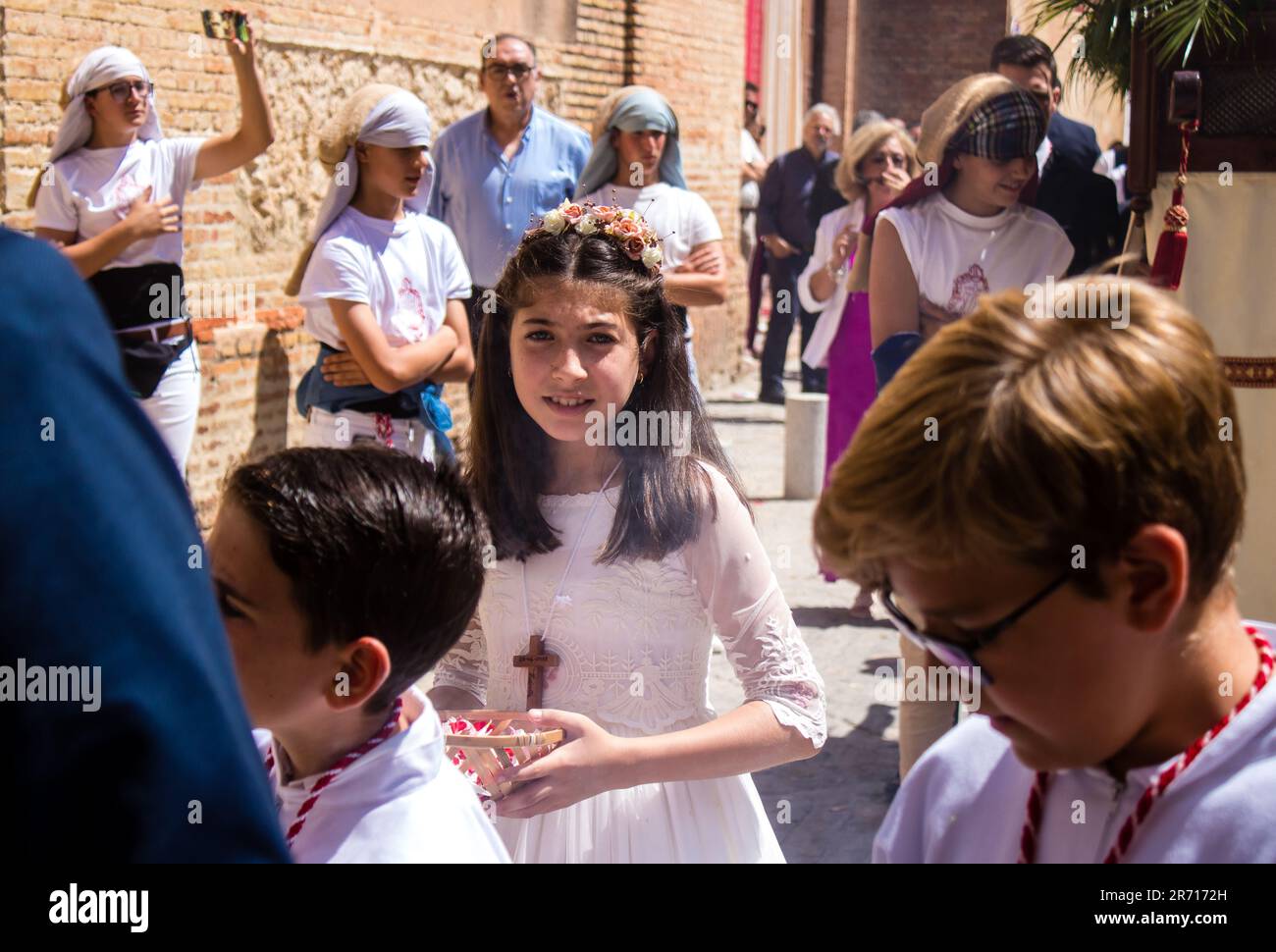 Young children participating at the Corpus Christi procession, an age ...