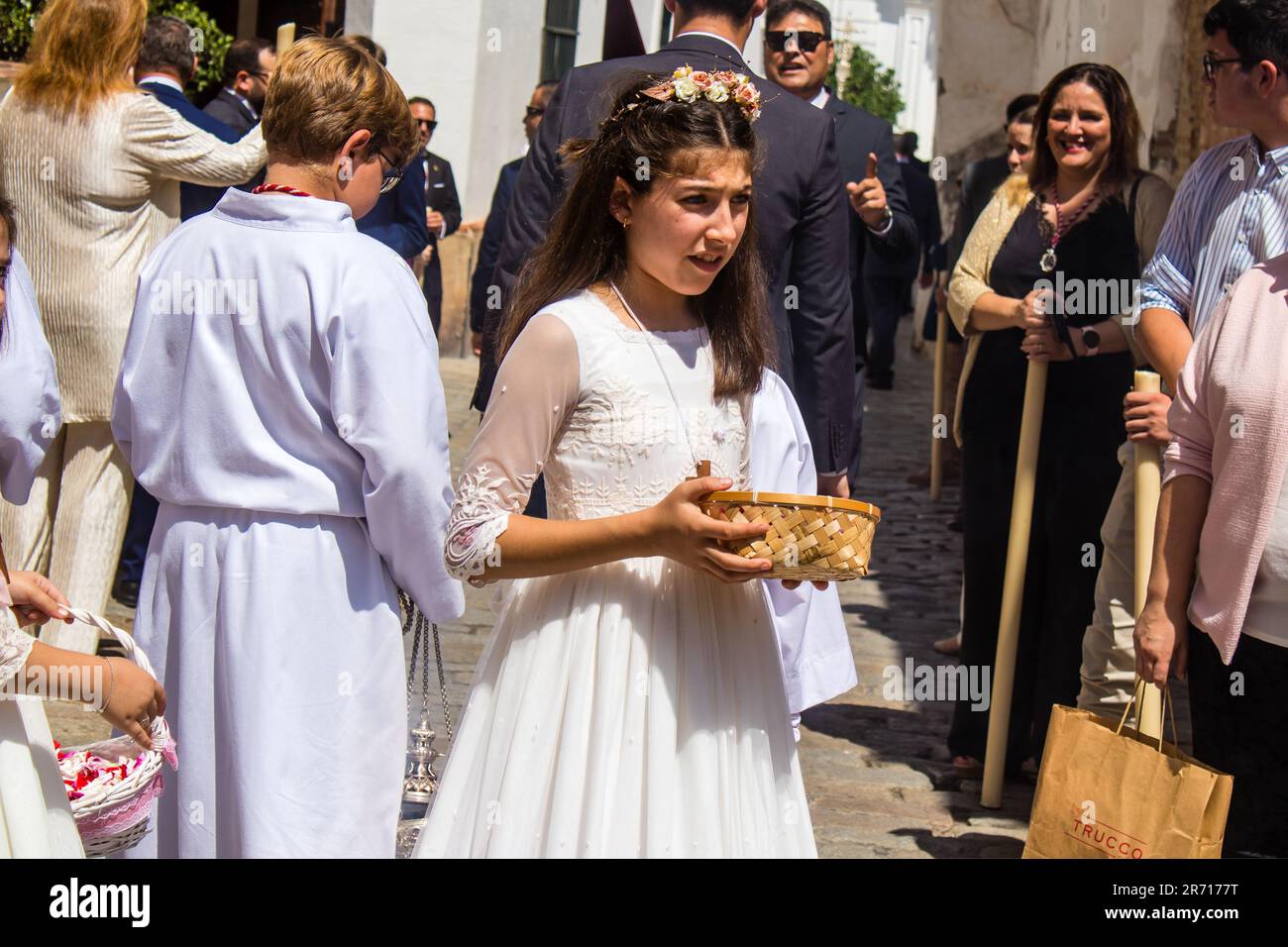 Young children participating at the Corpus Christi procession, an age ...