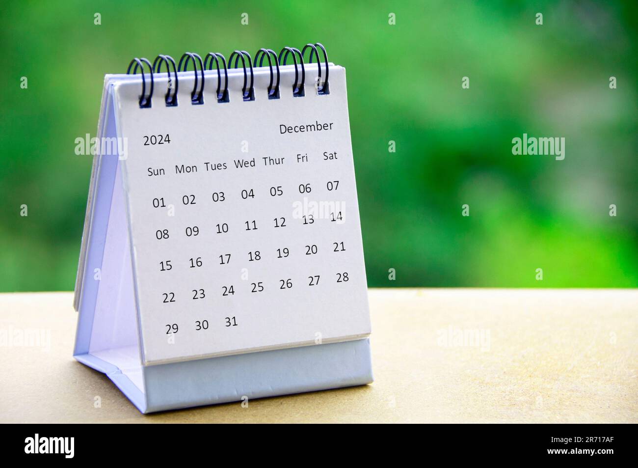 December 2024 white table calendar with customizable space for text ...