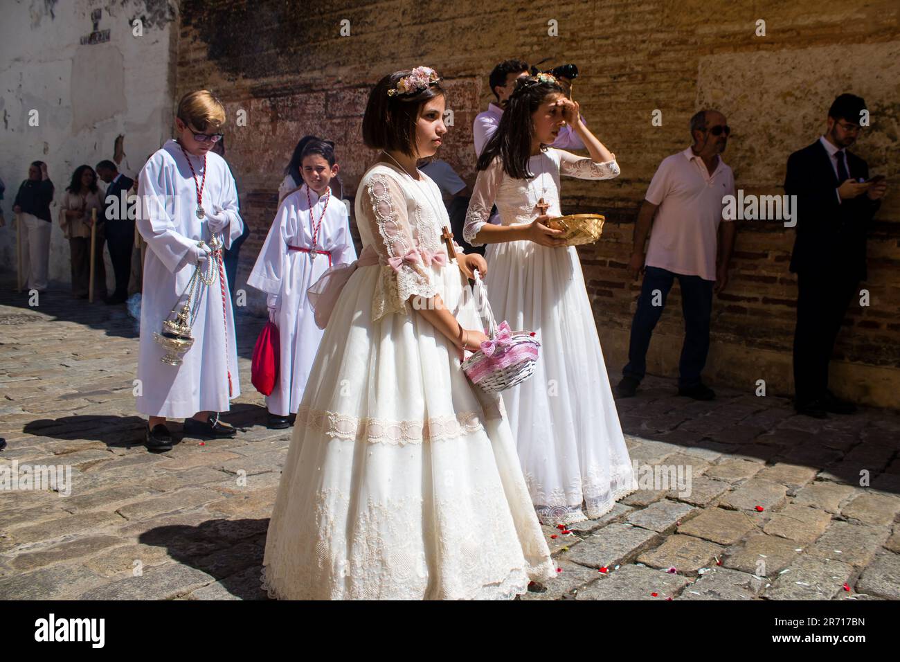 Young children participating at the Corpus Christi procession, an age ...