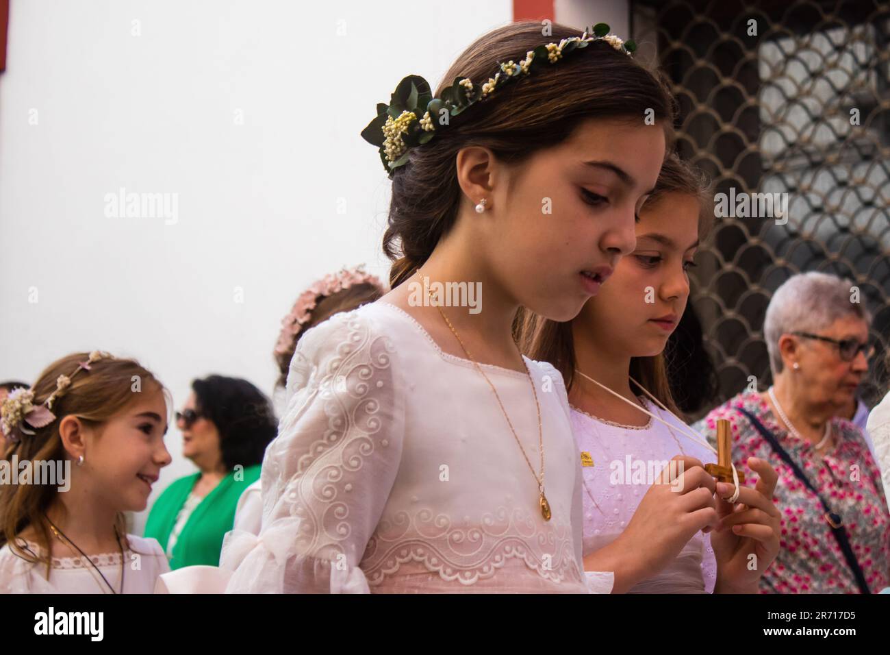 Young children participating at the Corpus Christi procession, an age ...
