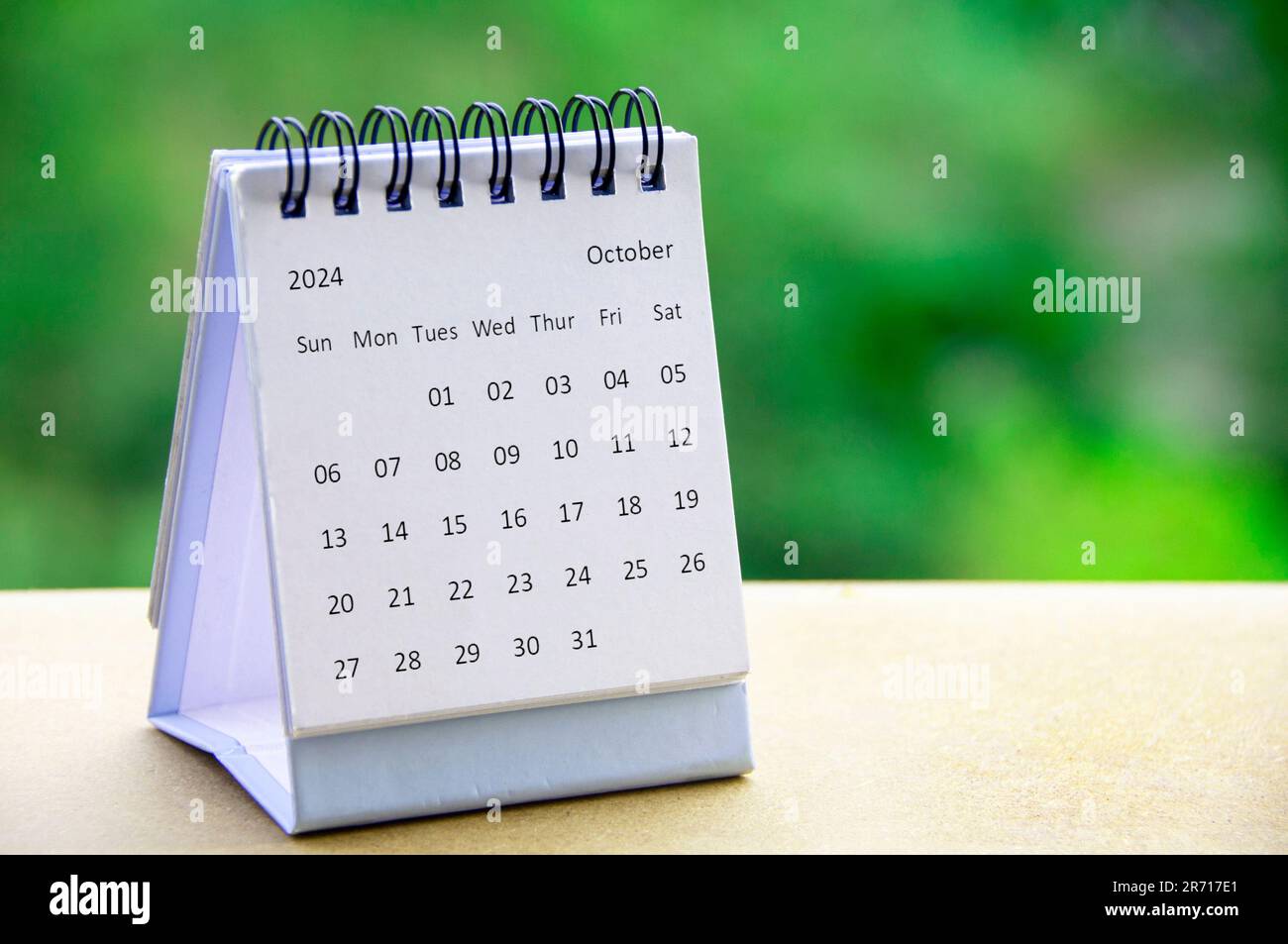 October 2024 white table calendar with customizable space for text ...