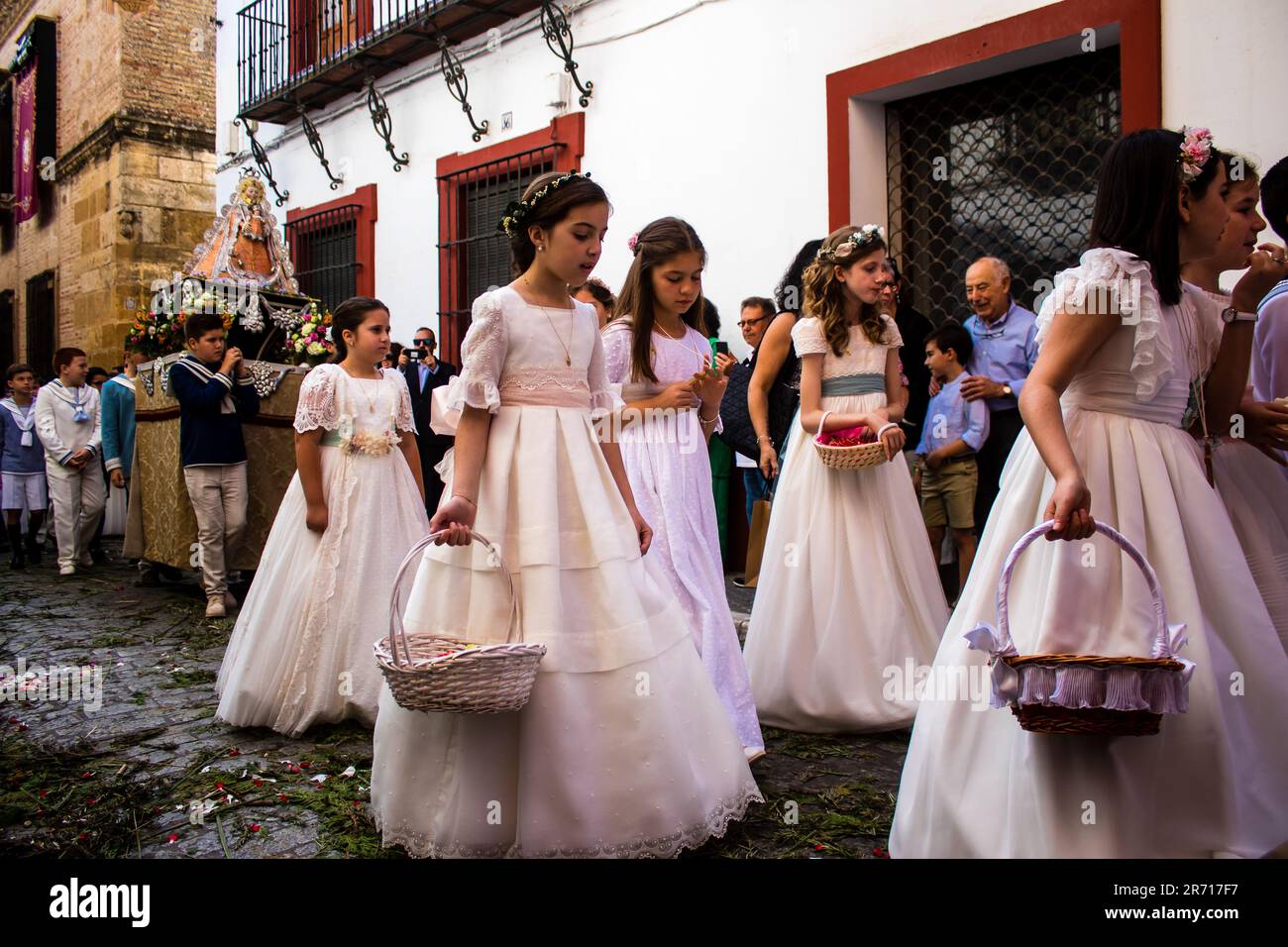 Young children participating at the Corpus Christi procession, an age ...