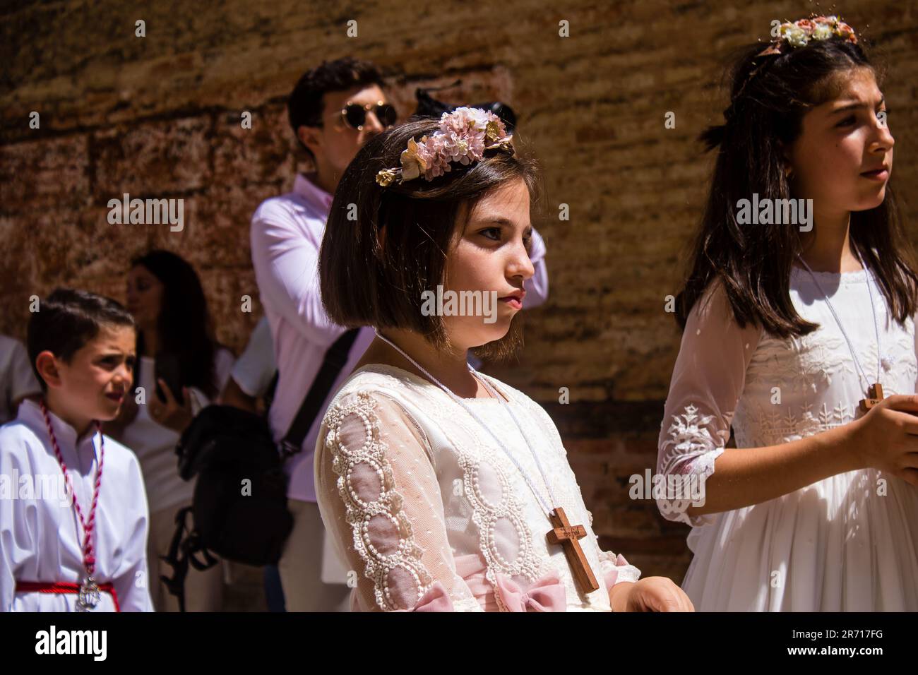 Young children participating at the Corpus Christi procession, an age ...