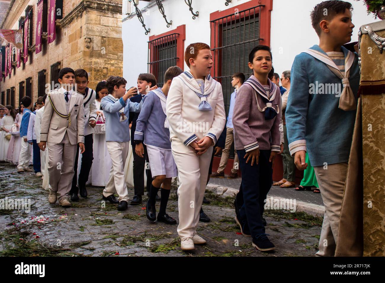 Young children participating at the Corpus Christi procession, an age ...