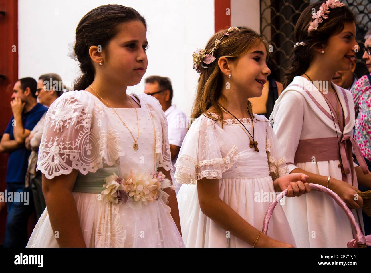 Young children participating at the Corpus Christi procession, an age ...