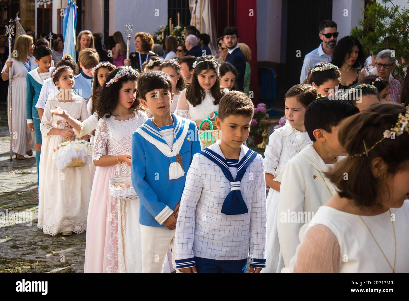 Young children participating at the Corpus Christi procession, an age ...