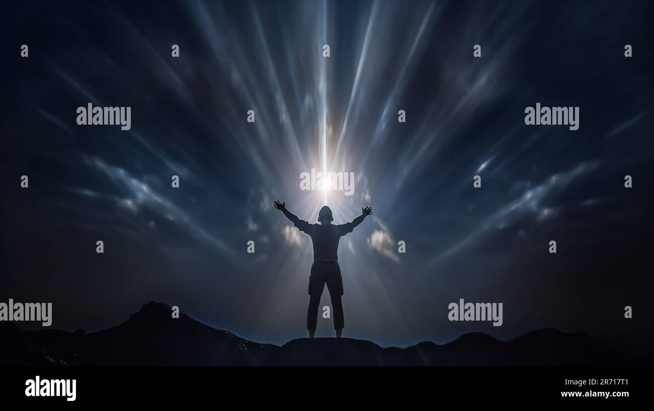 Man with arms to the sky illuminated by a beam of heavenly light Stock ...