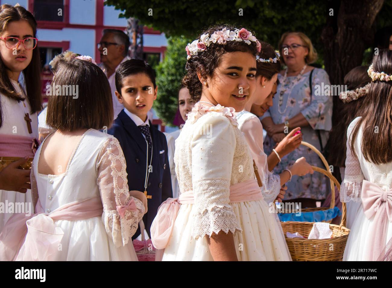 Young children participating at the Corpus Christi procession, an age ...