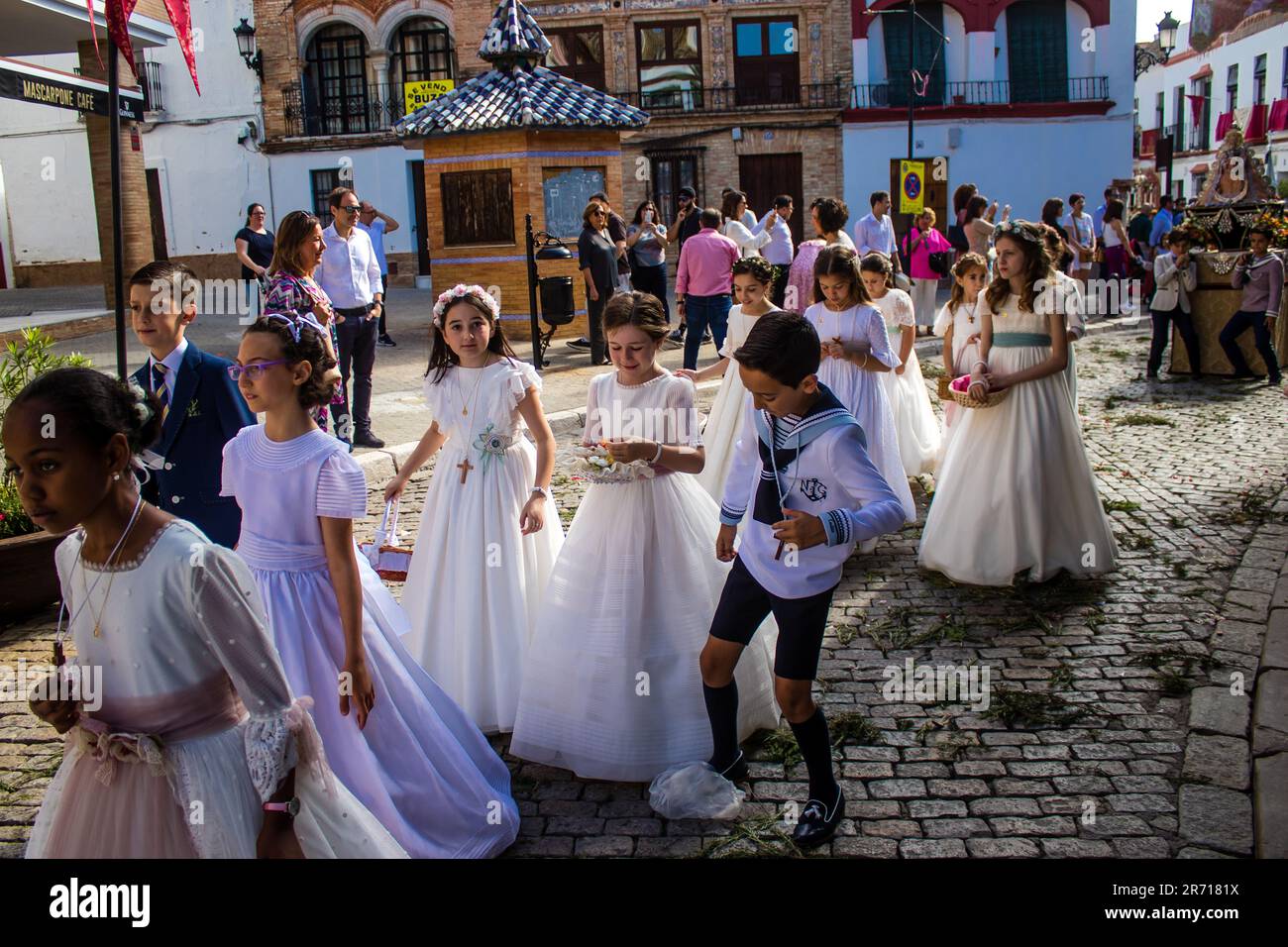 Young children participating at the Corpus Christi procession, an age ...