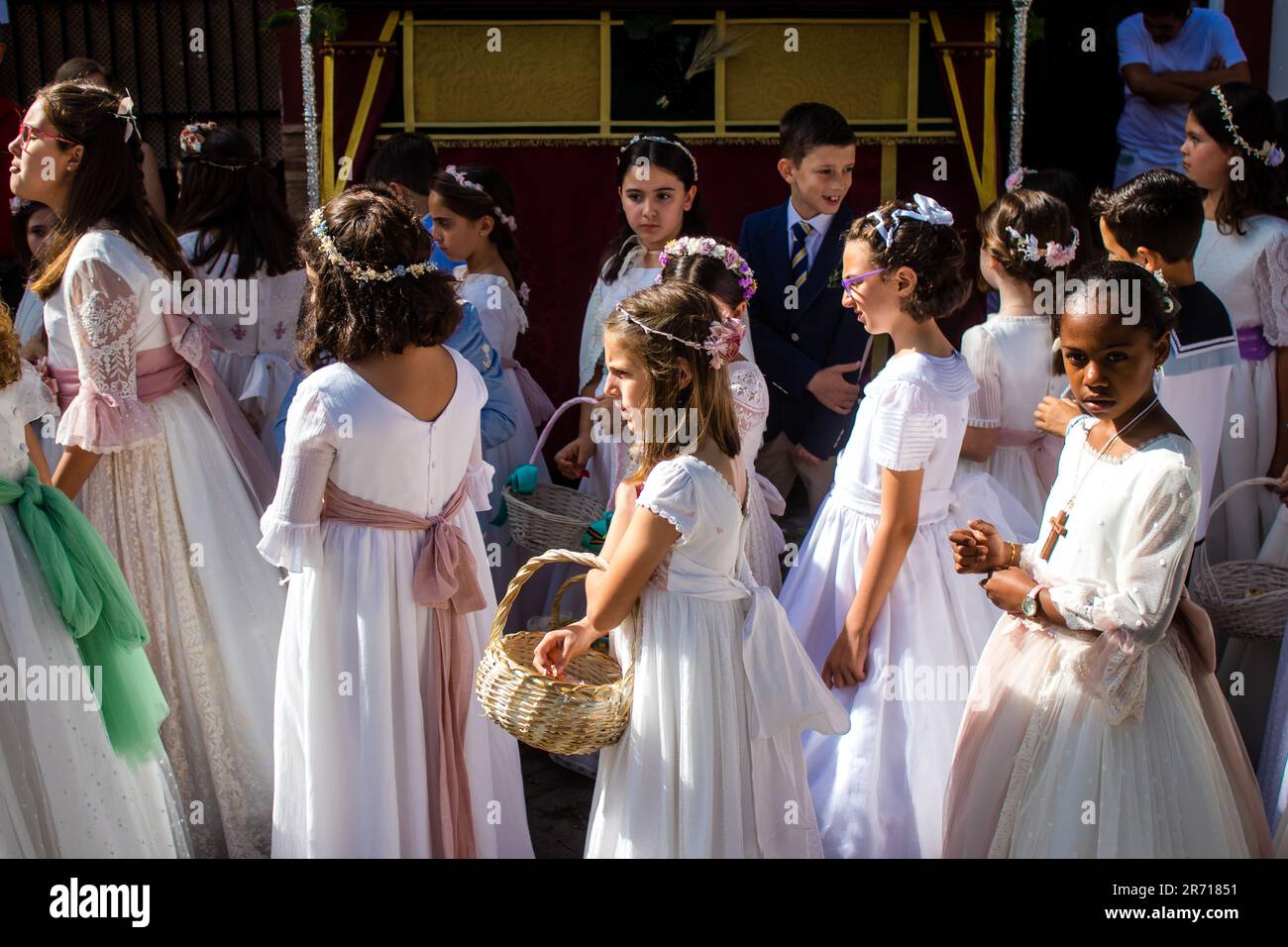 Young children participating at the Corpus Christi procession, an age ...