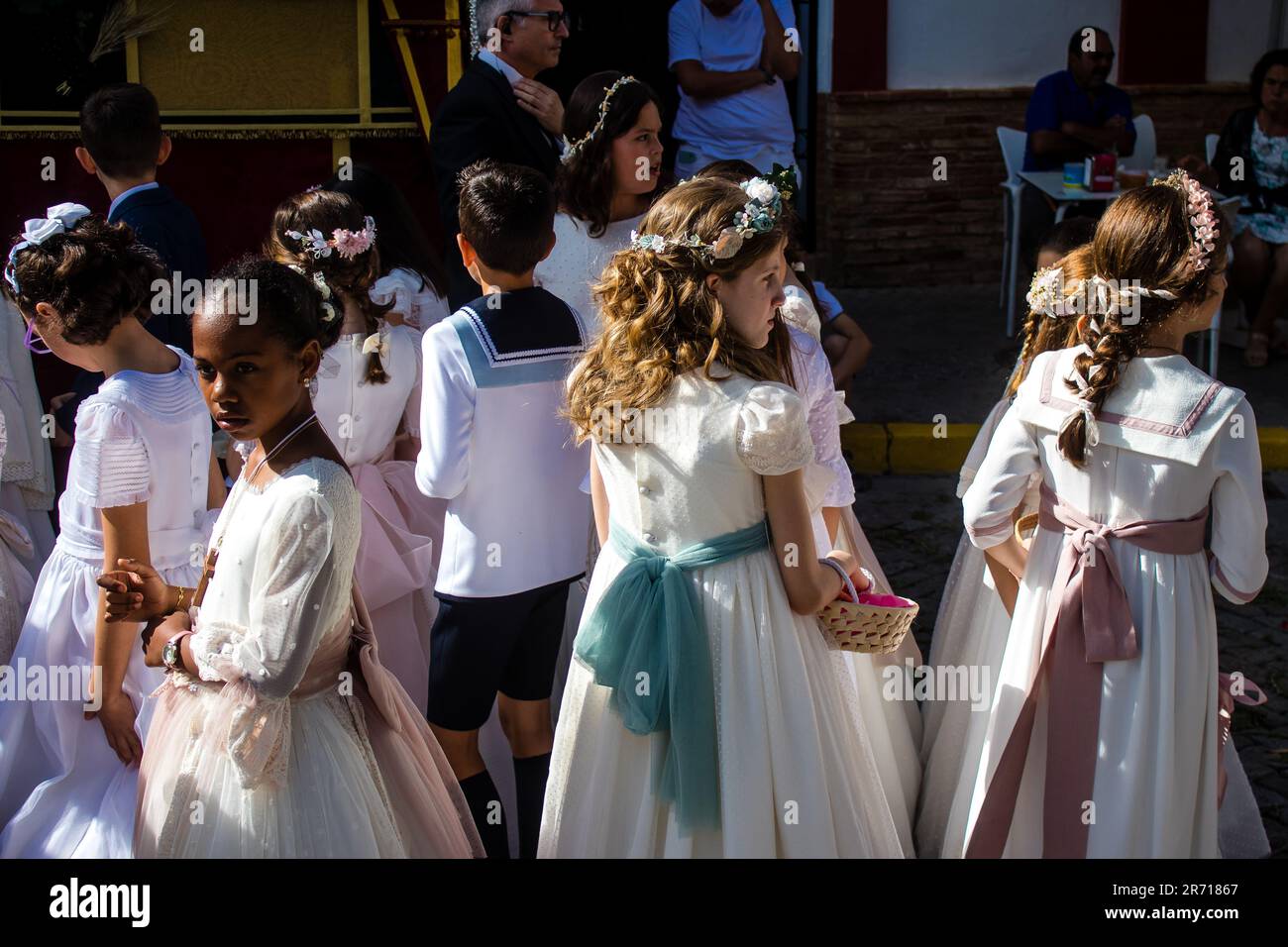 Young children participating at the Corpus Christi procession, an age ...