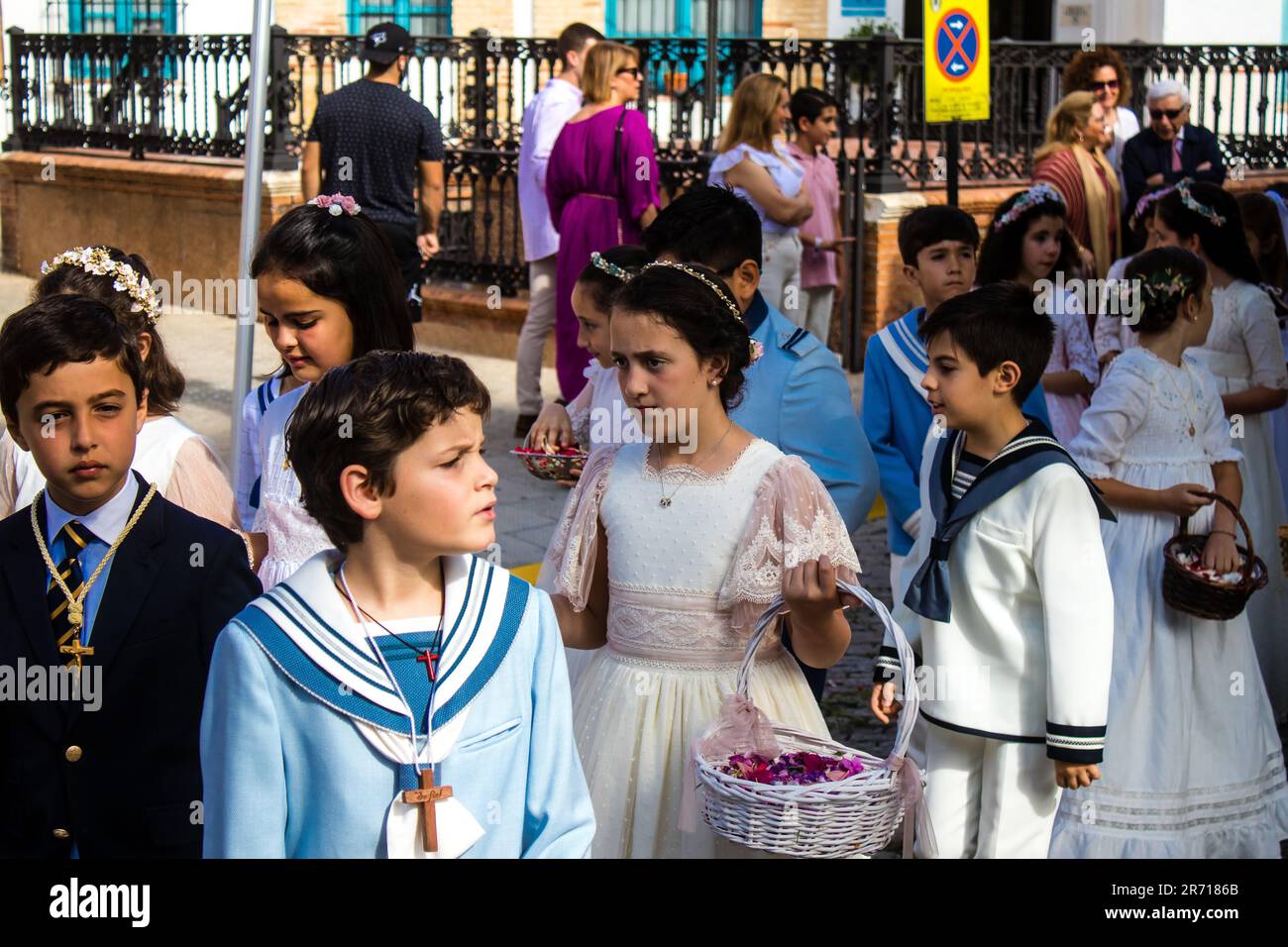 Young children participating at the Corpus Christi procession, an age ...