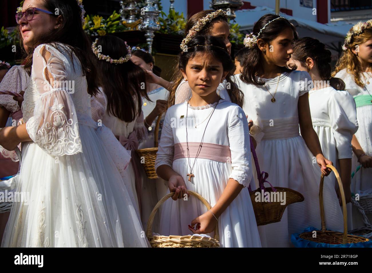 Young children participating at the Corpus Christi procession, an age ...