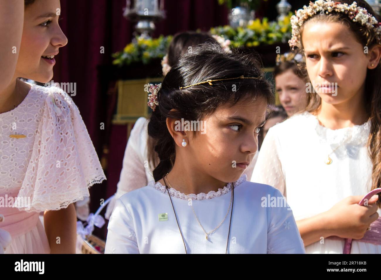 Young children participating at the Corpus Christi procession, an age ...