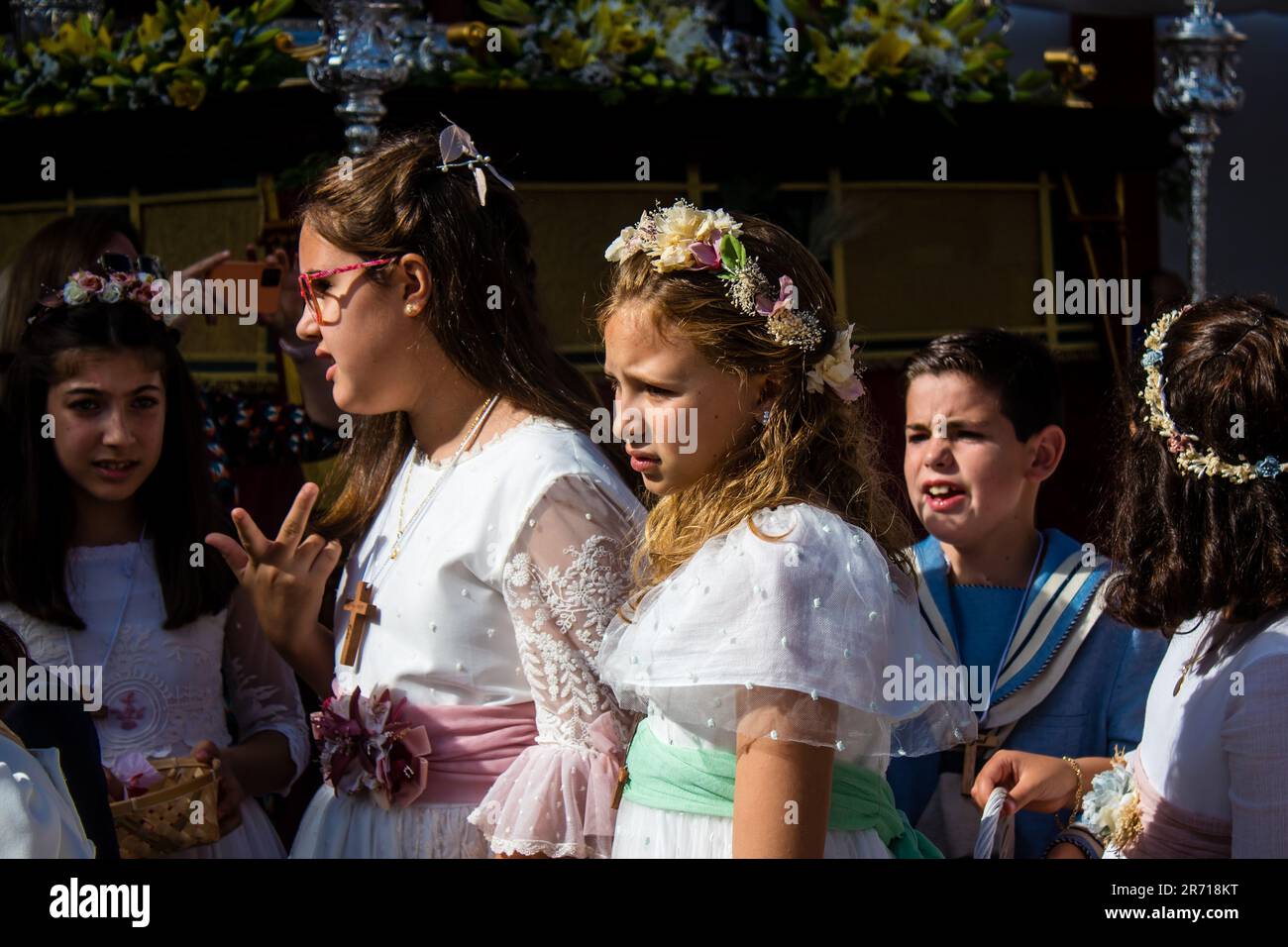 Young children participating at the Corpus Christi procession, an age ...
